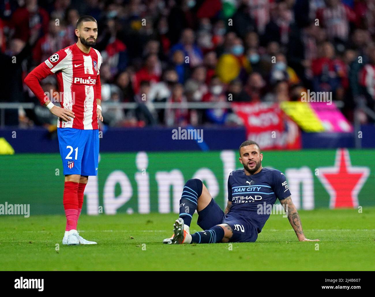 Manchester City's Kyle Walker (right) goes down injured during the UEFA ...