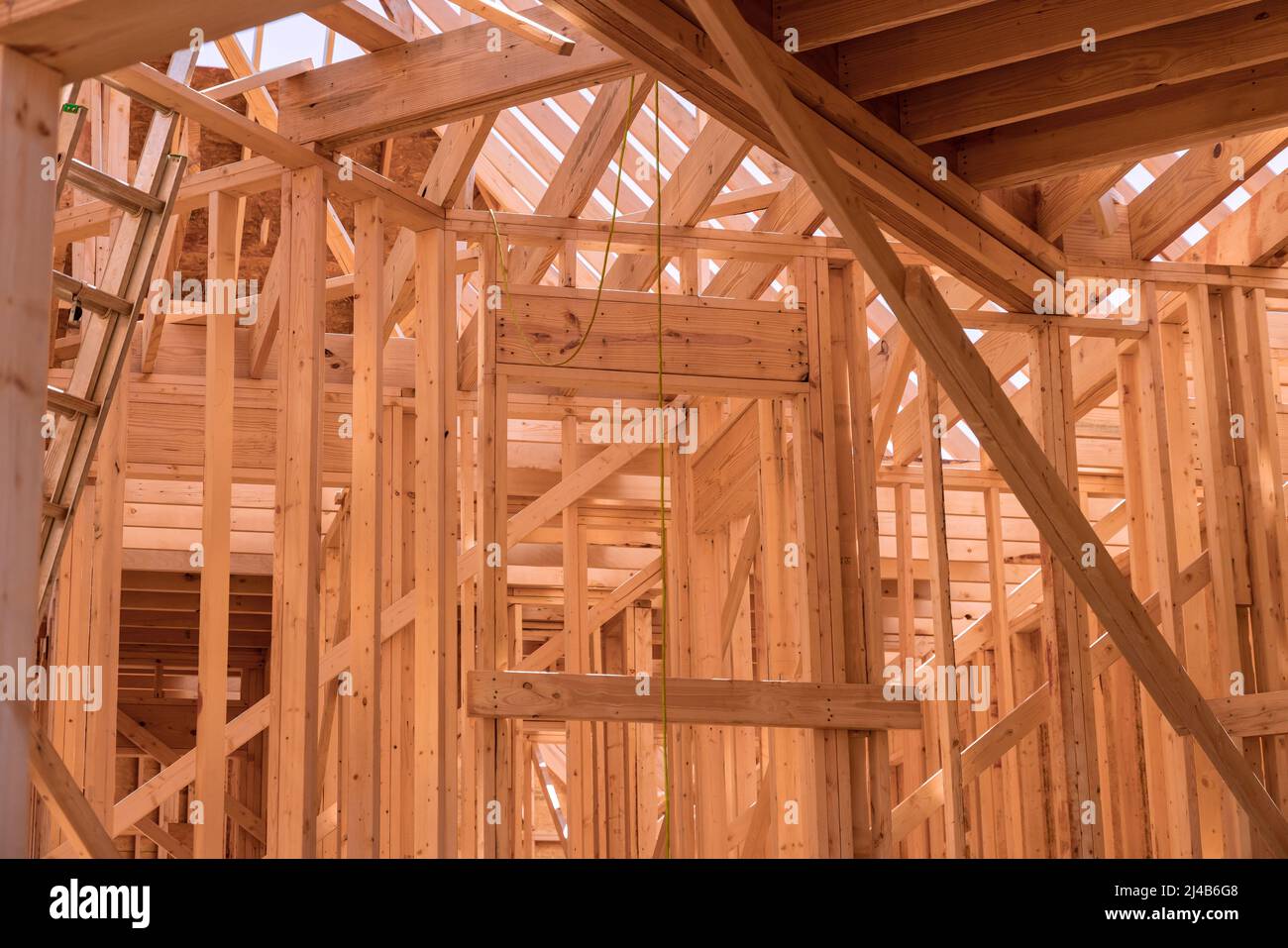 New house construction with wooden beams the ceiling and wall Stock ...
