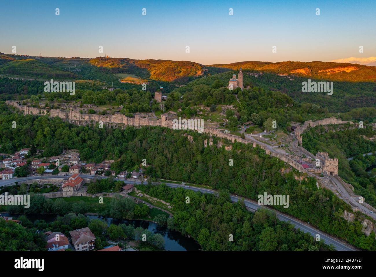Sunset aerial view of Tsarevets fortress in Veliko Tarnovo, Bulgaria ...