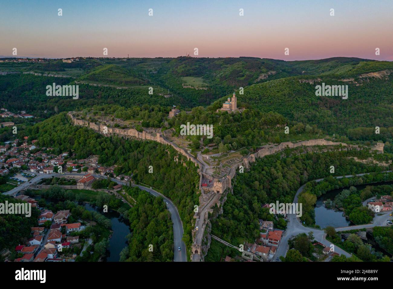 Sunset aerial view of Tsarevets fortress in Veliko Tarnovo, Bulgaria ...