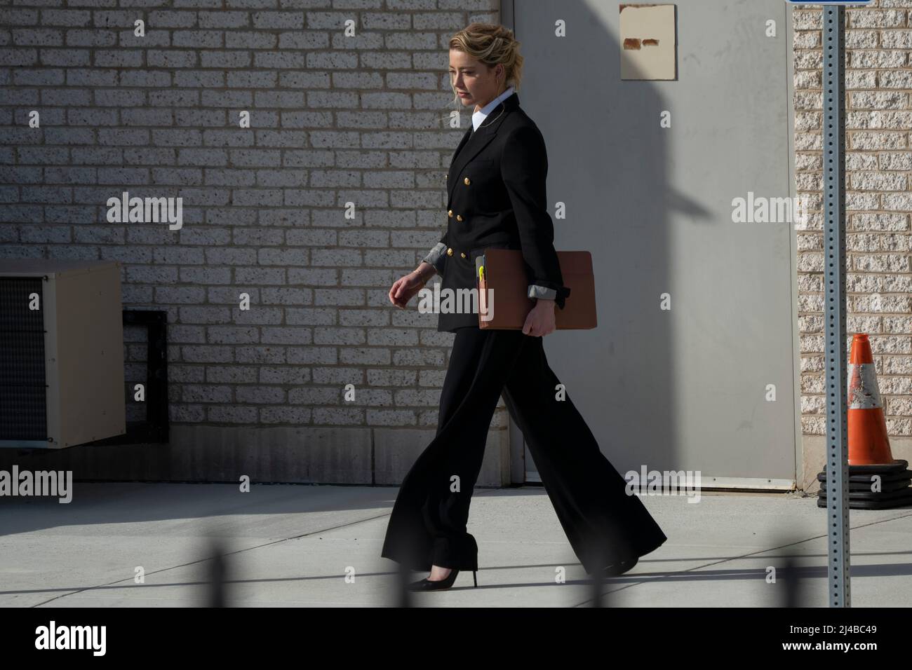Fairfax, VA, USA. 13th Apr, 2022. Actor Amber Heard departs from the ...