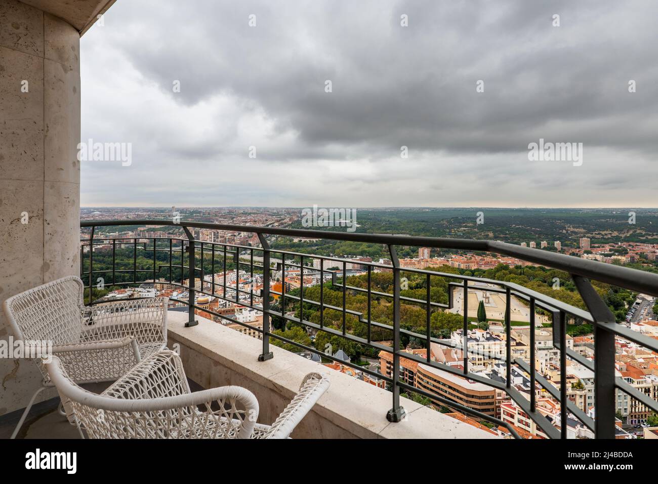 High-rise residential terrace with views of part of the city of Madrid ...