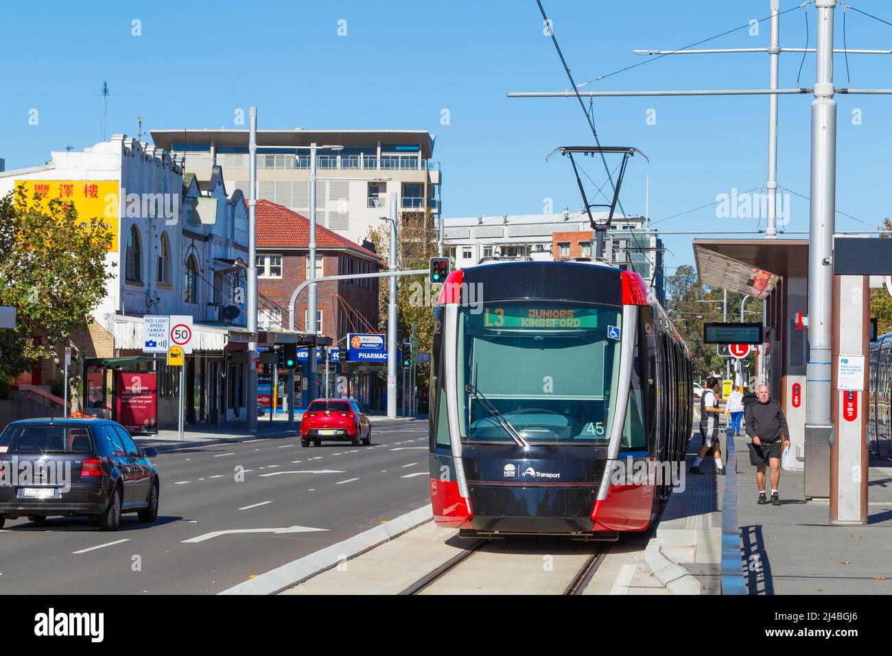 Looking south along Anzac Parade in Kensington, Sydney, Australia, with ...