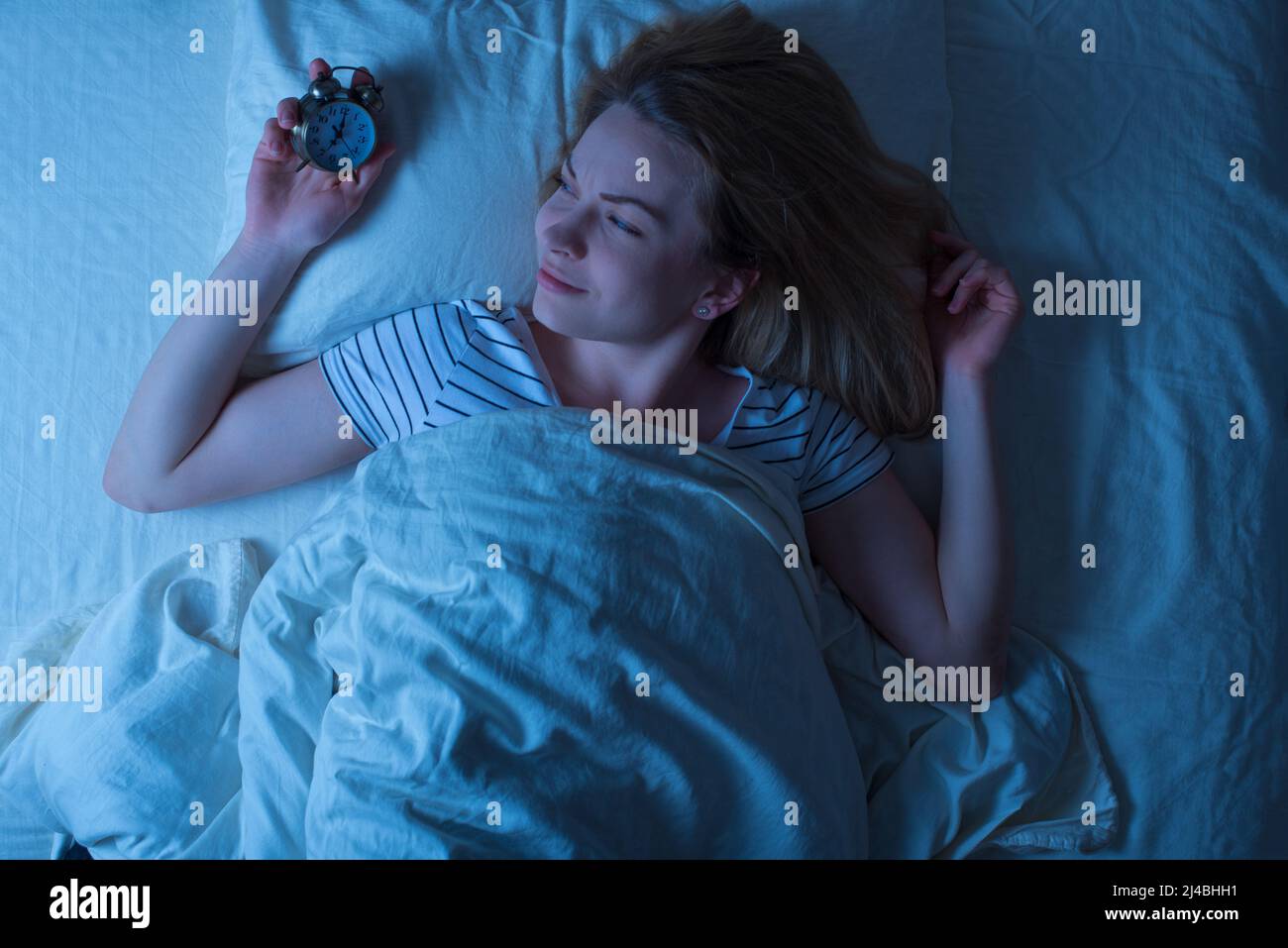 Alarm clock woman energy hi-res stock photography and images - Alamy