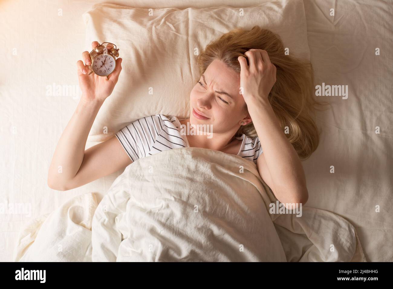 Alarm clock woman energy hi-res stock photography and images - Alamy