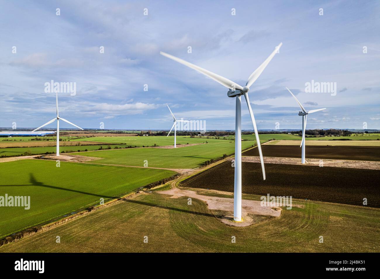 Wind farm turbines spinning in high wind Stock Photo - Alamy