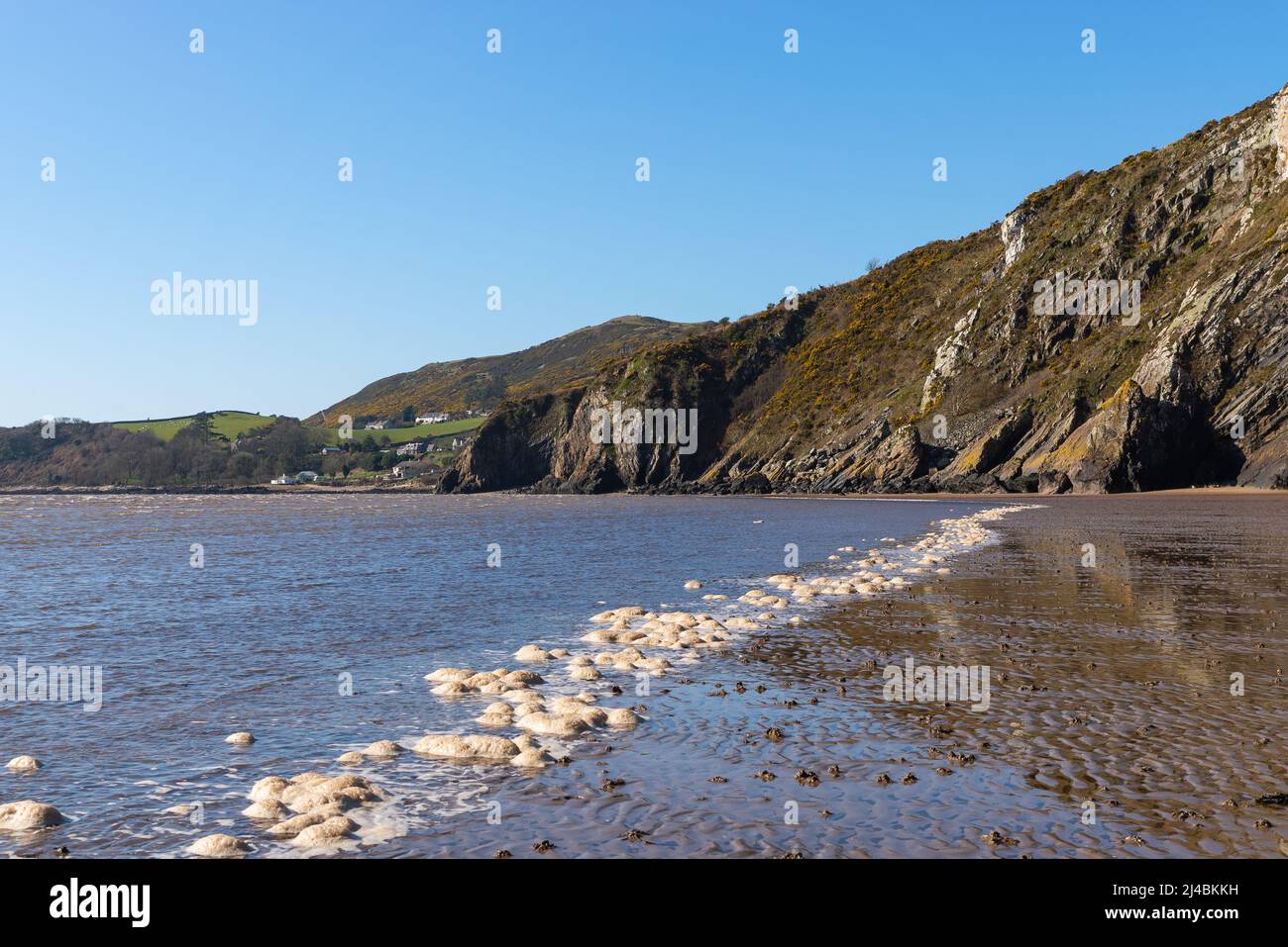Cliff walls on the Solway Coast in the late morning light. Sandyhills ...