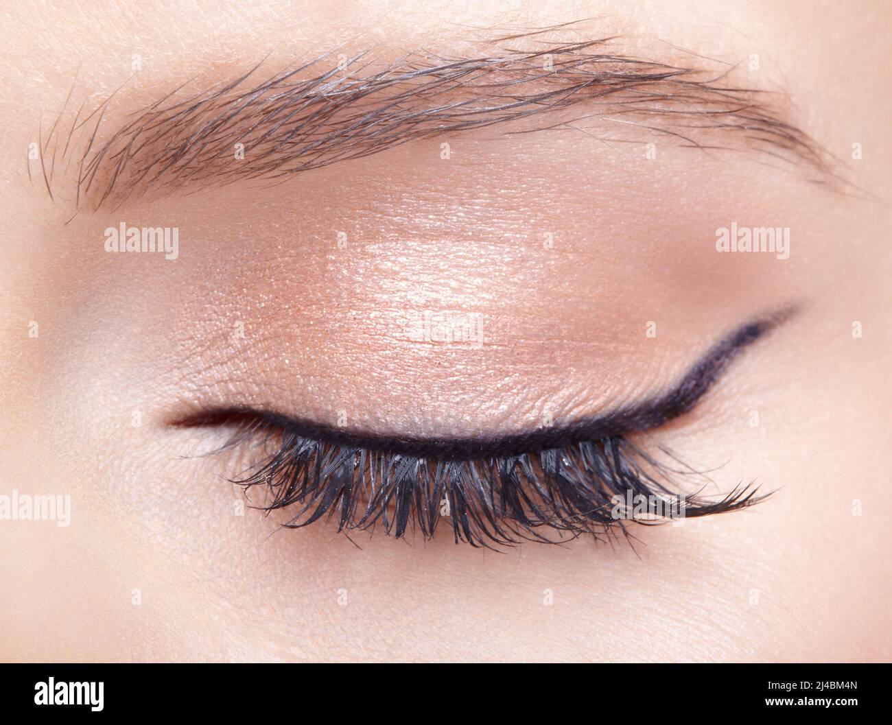 Closeup macro shot of human female closed eye. Woman with natural vogue ...