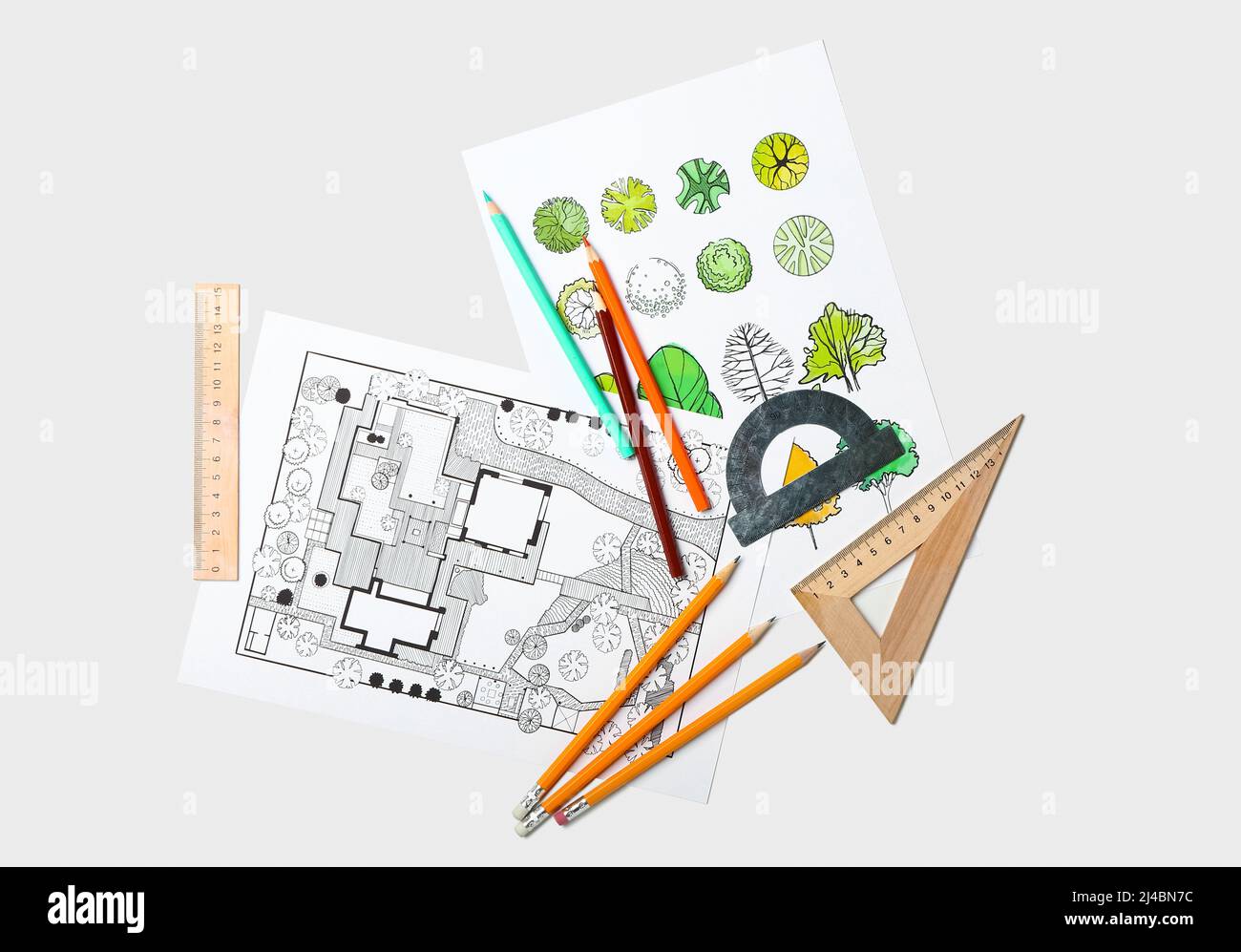 Paper sheets with sketches for landscape design and stationery on light ...