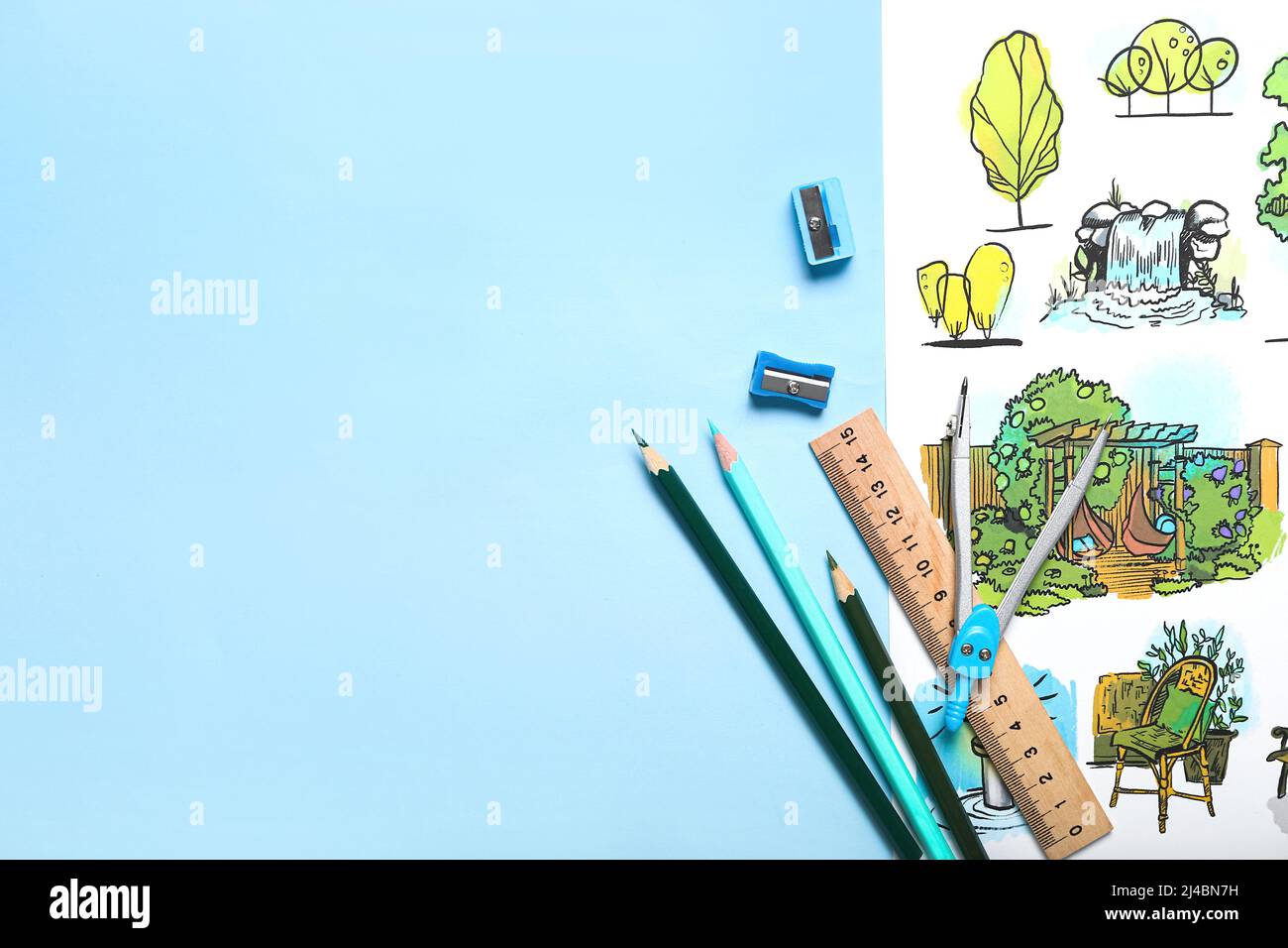 Paper sheet with sketches for landscape design and stationery on color ...