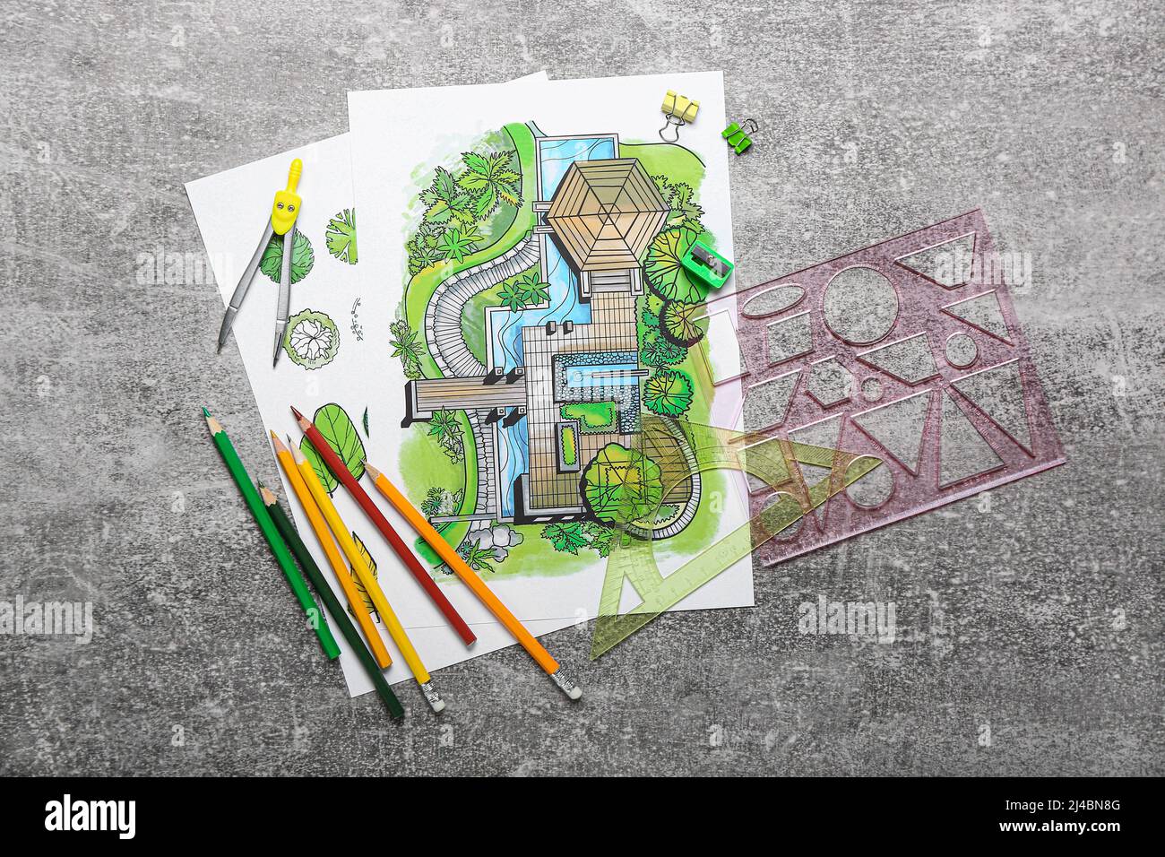 Paper sheets with sketches for landscape design and stationery on ...