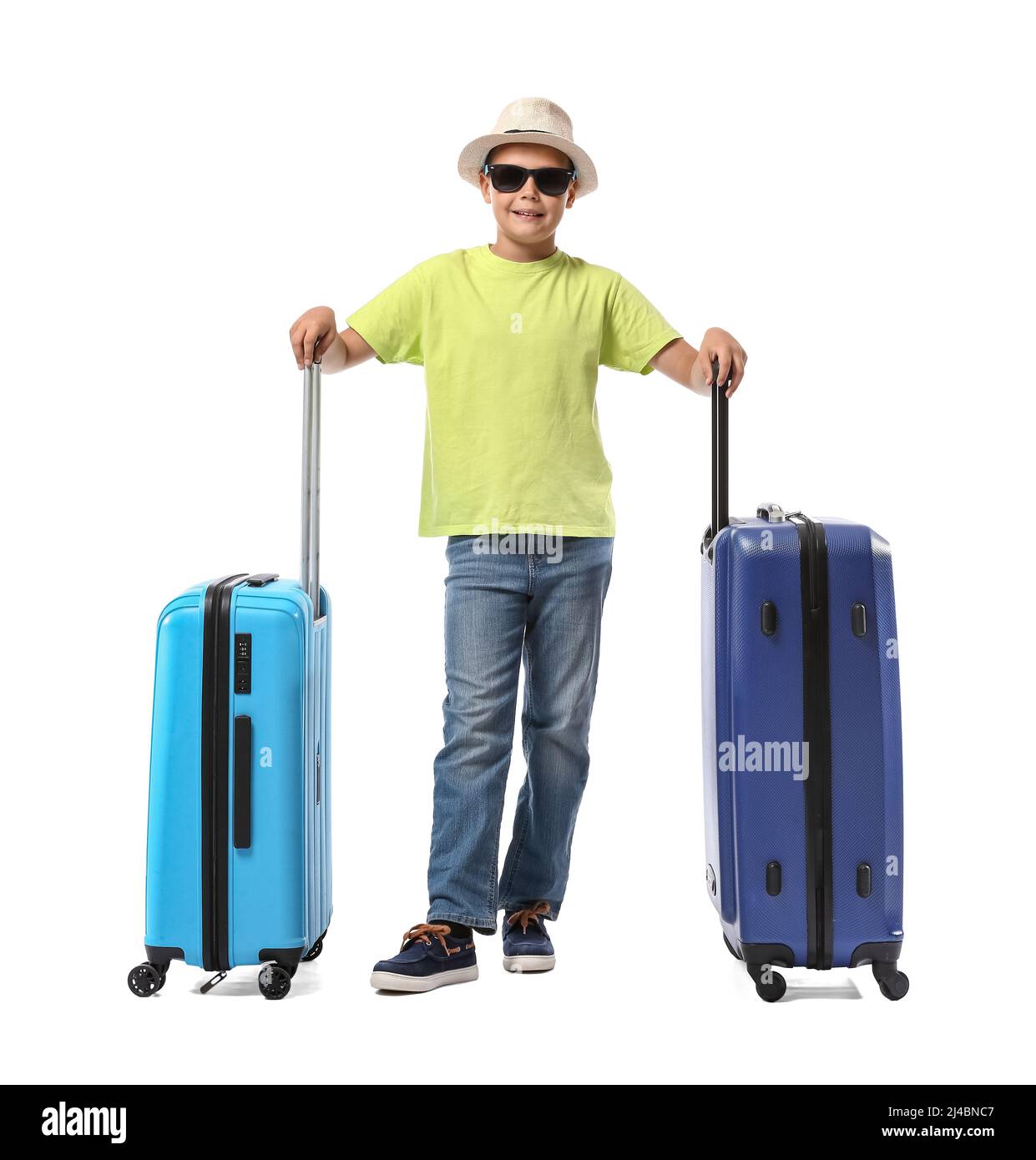 Cute little boy with suitcases isolated on white Stock Photo - Alamy