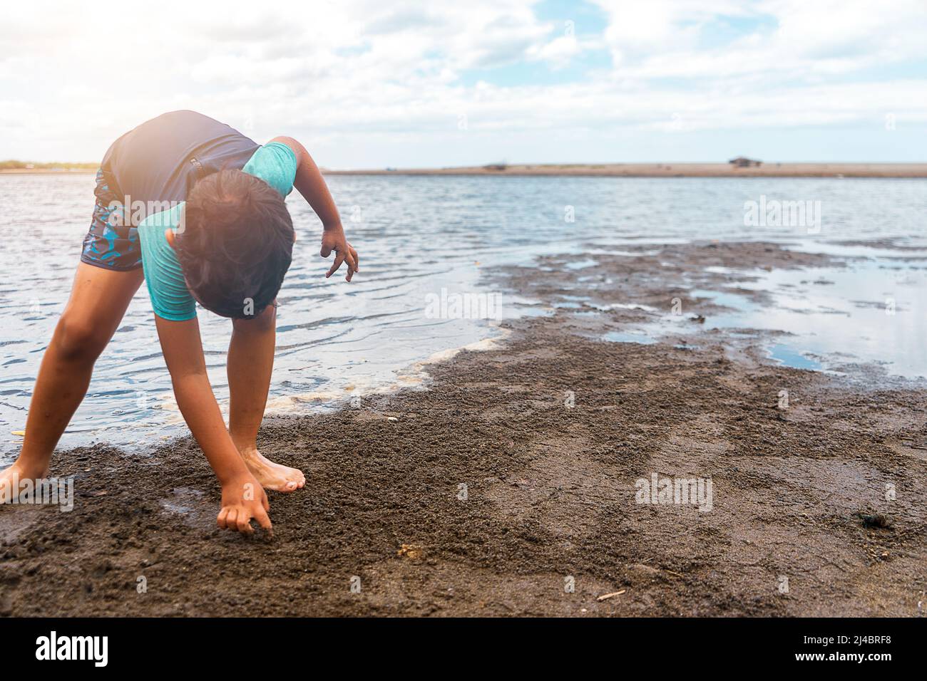 Child boy digging treasure in hi-res stock photography and images - Alamy