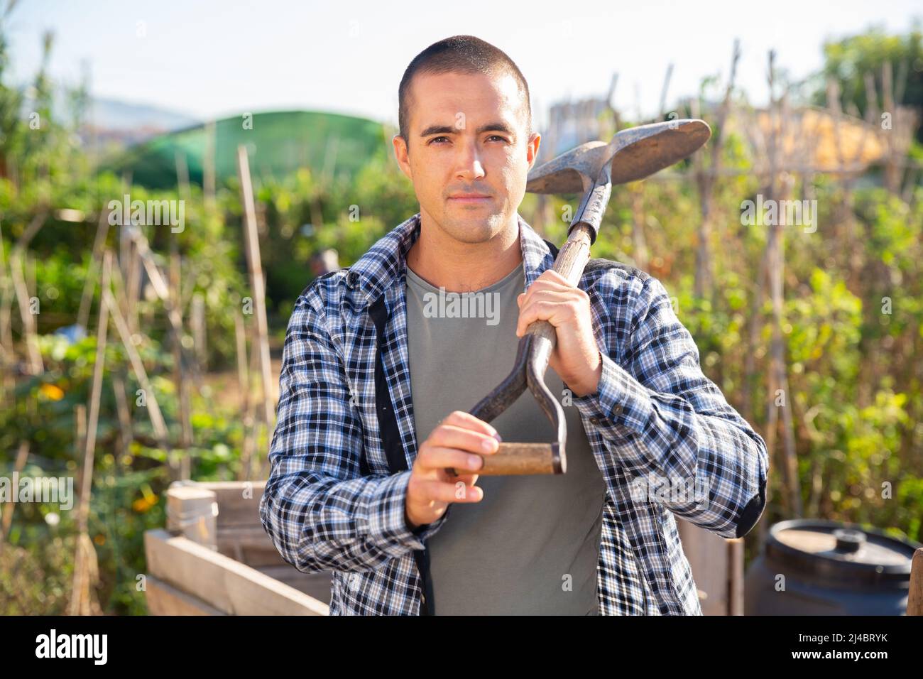 Happy gardener posing tools hi-res stock photography and images - Alamy