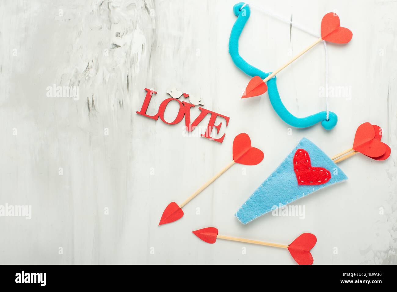 Valentine's Day theme with bow and arrow cupid, with space for layout ...