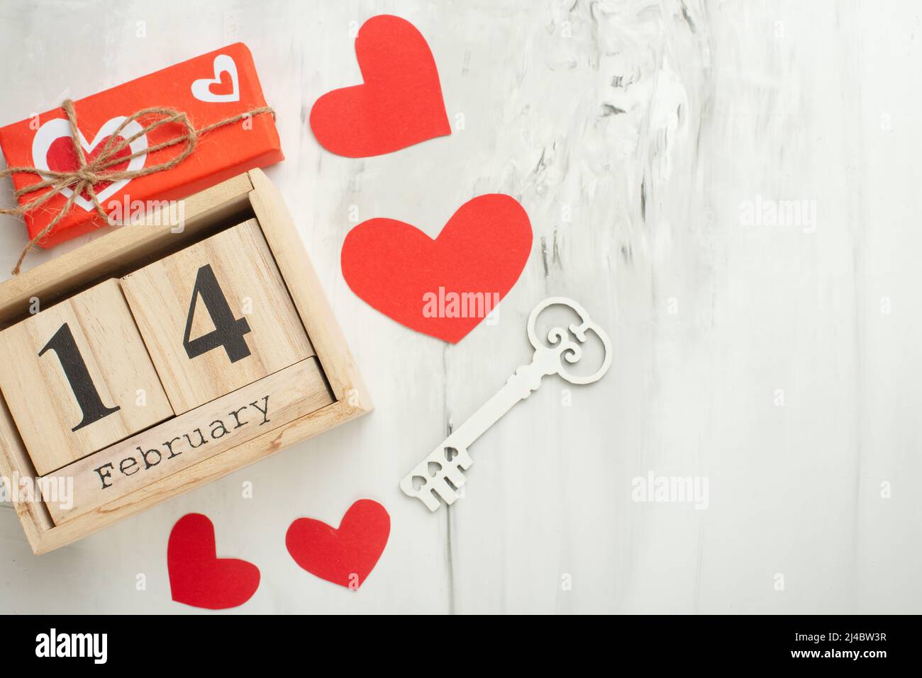 Valentine's Day theme with wooden block calendar Stock Photo - Alamy