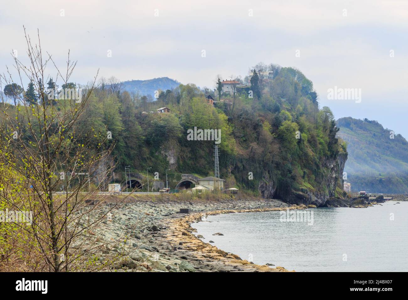 Village on the top of the hill and tunnels near Hopa city in Artvin ...