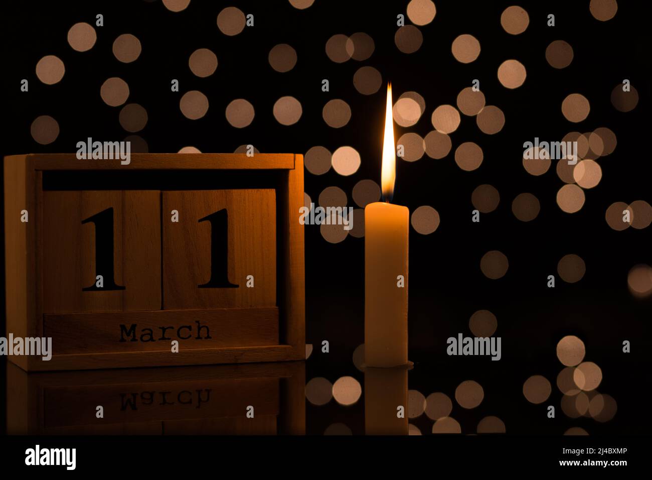 Candle and calendar from March 11, in connection with mourning at the ...