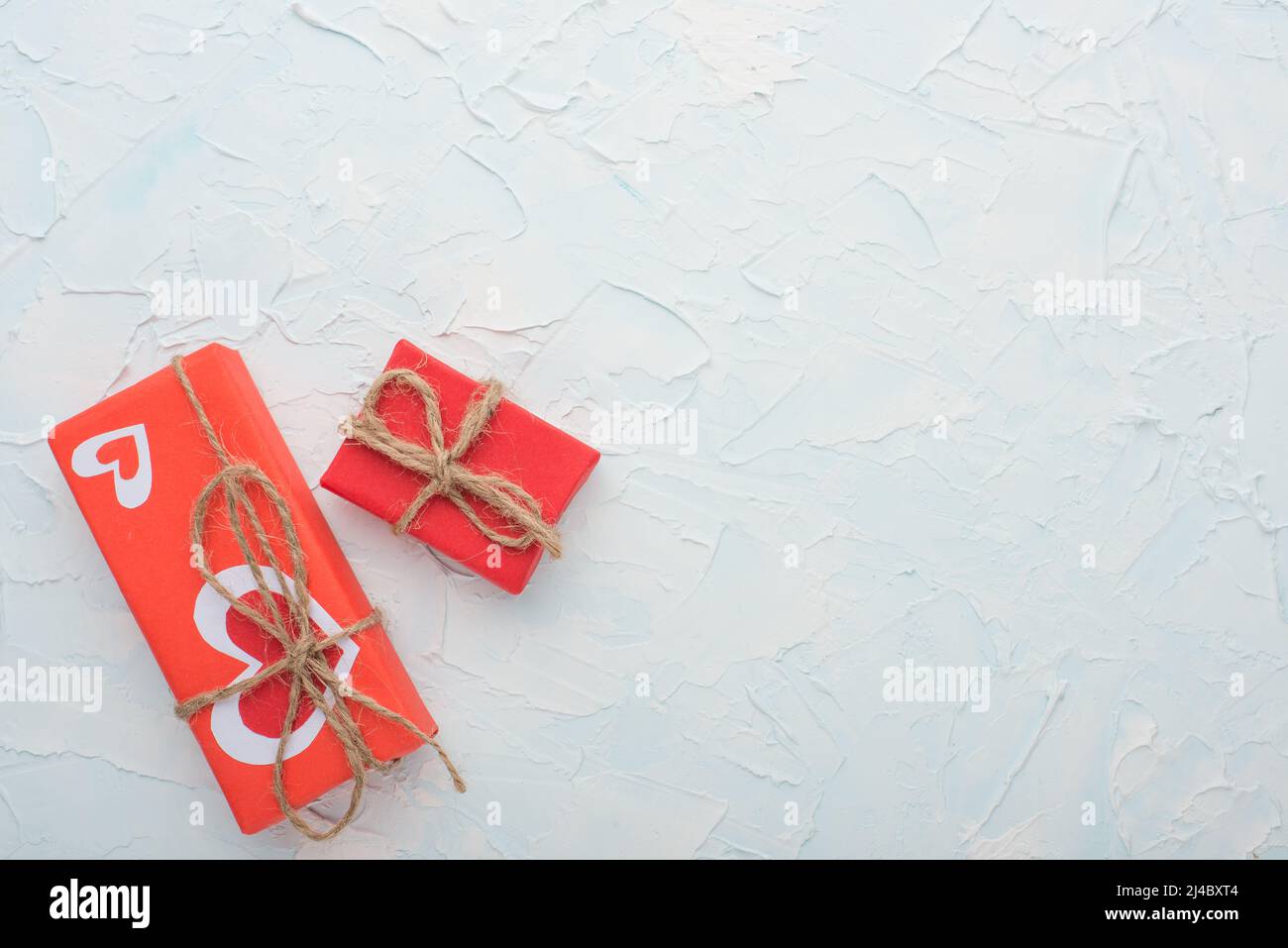 Two gifts on a light background with an empty space for writing or ...