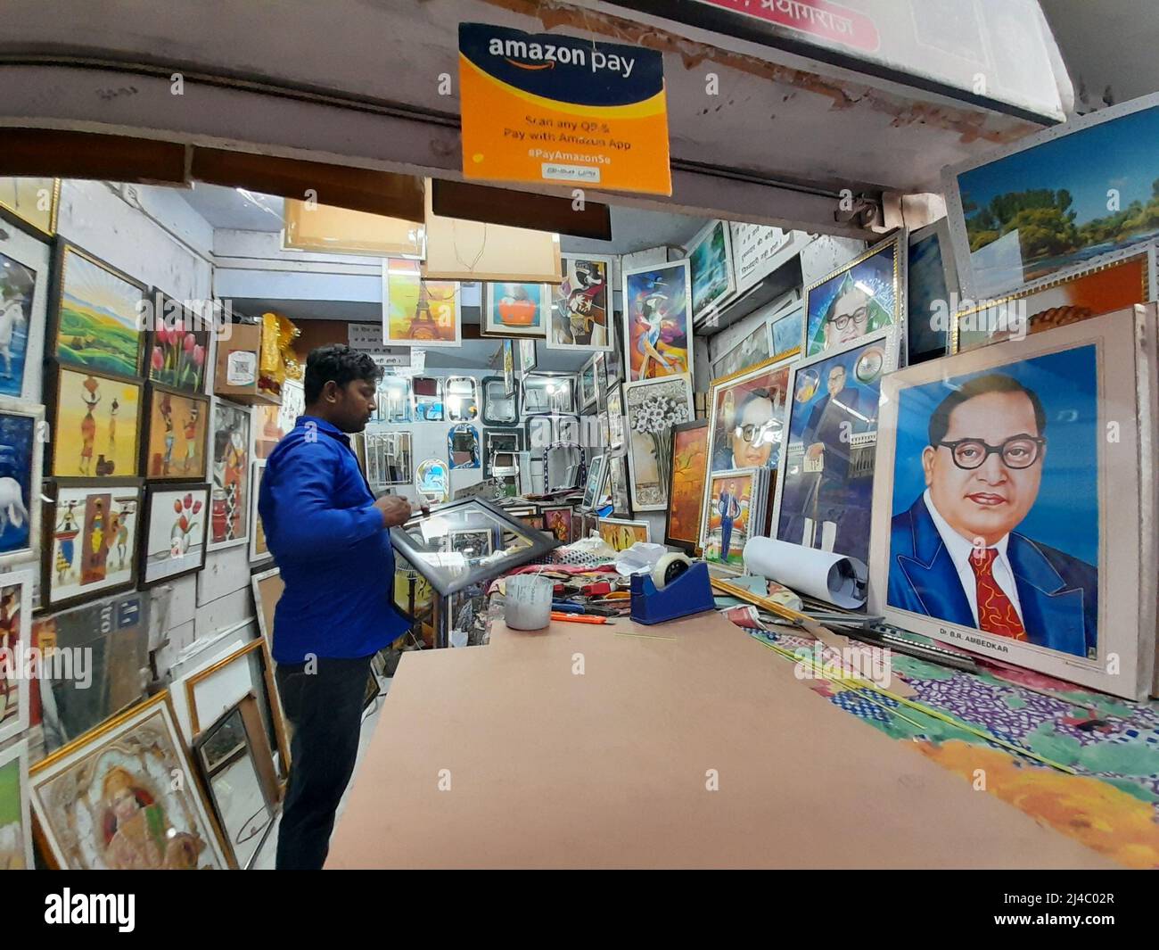 Shopkeeper selling the photo frame of "Father of Indian Constitution ...