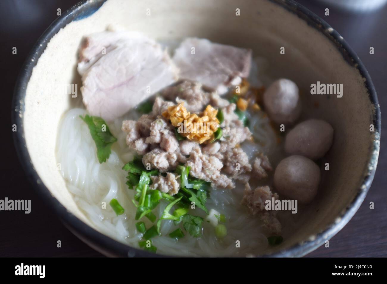 Minced pork and small line noodle with meatball Stock Photo - Alamy