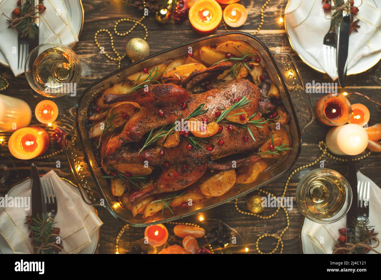 Festive dinner, baked delicious duck with fruits, flat lay, festive ...