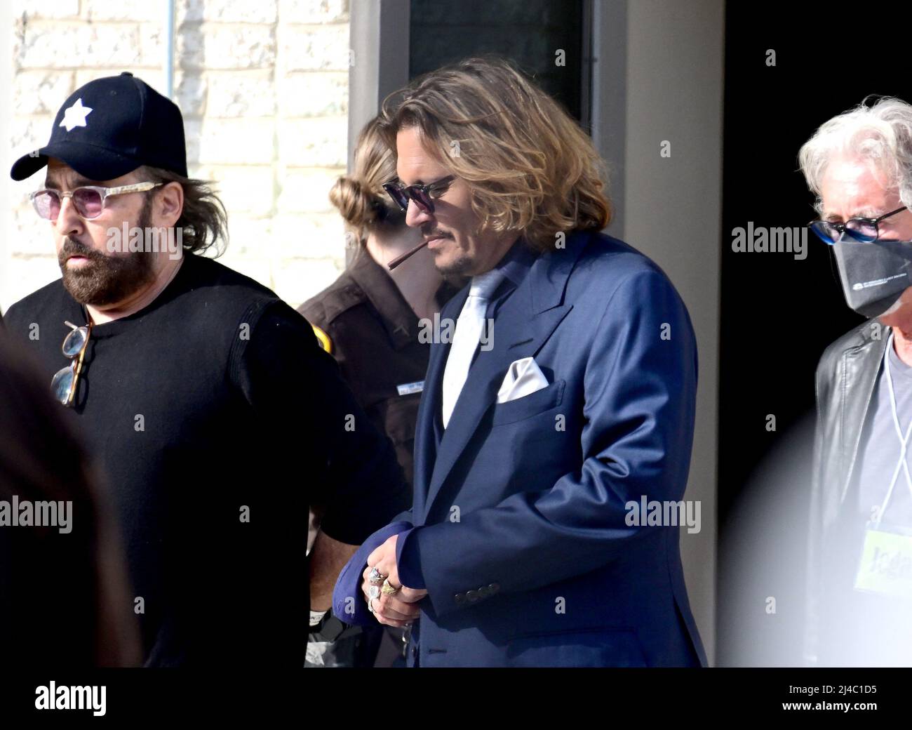 Johnny Depp departs after his trial recessed for the day at the Fairfax ...