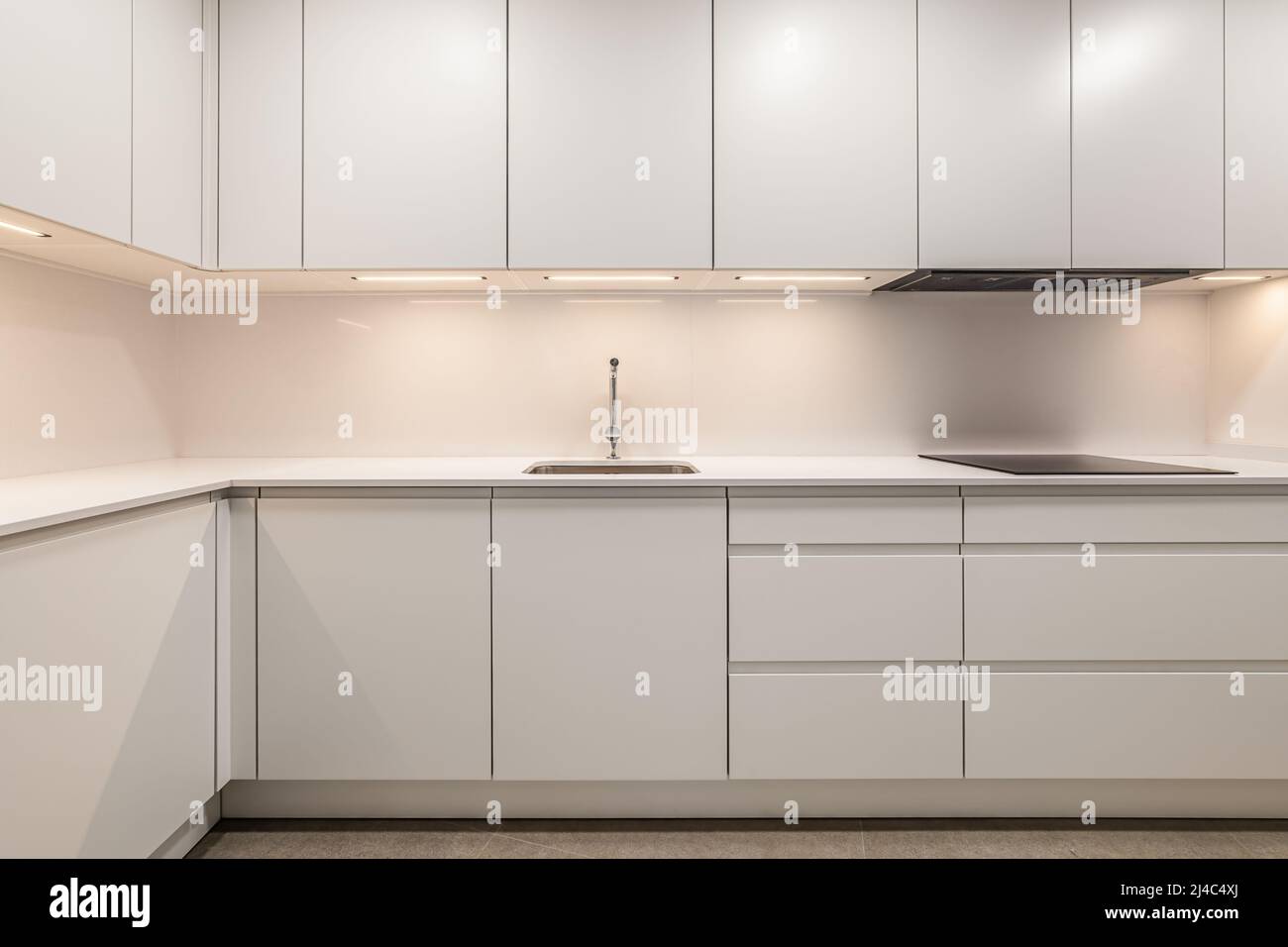 White empty classic kitchen in front view in new or refurbished ...