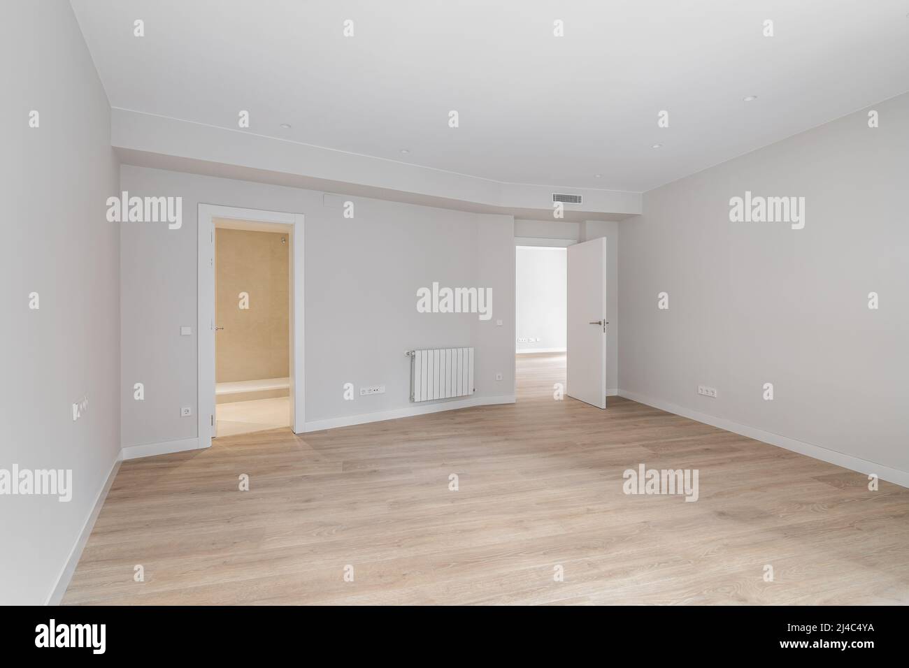 Modern and empty contemporary interior. White walls and doors in new ...