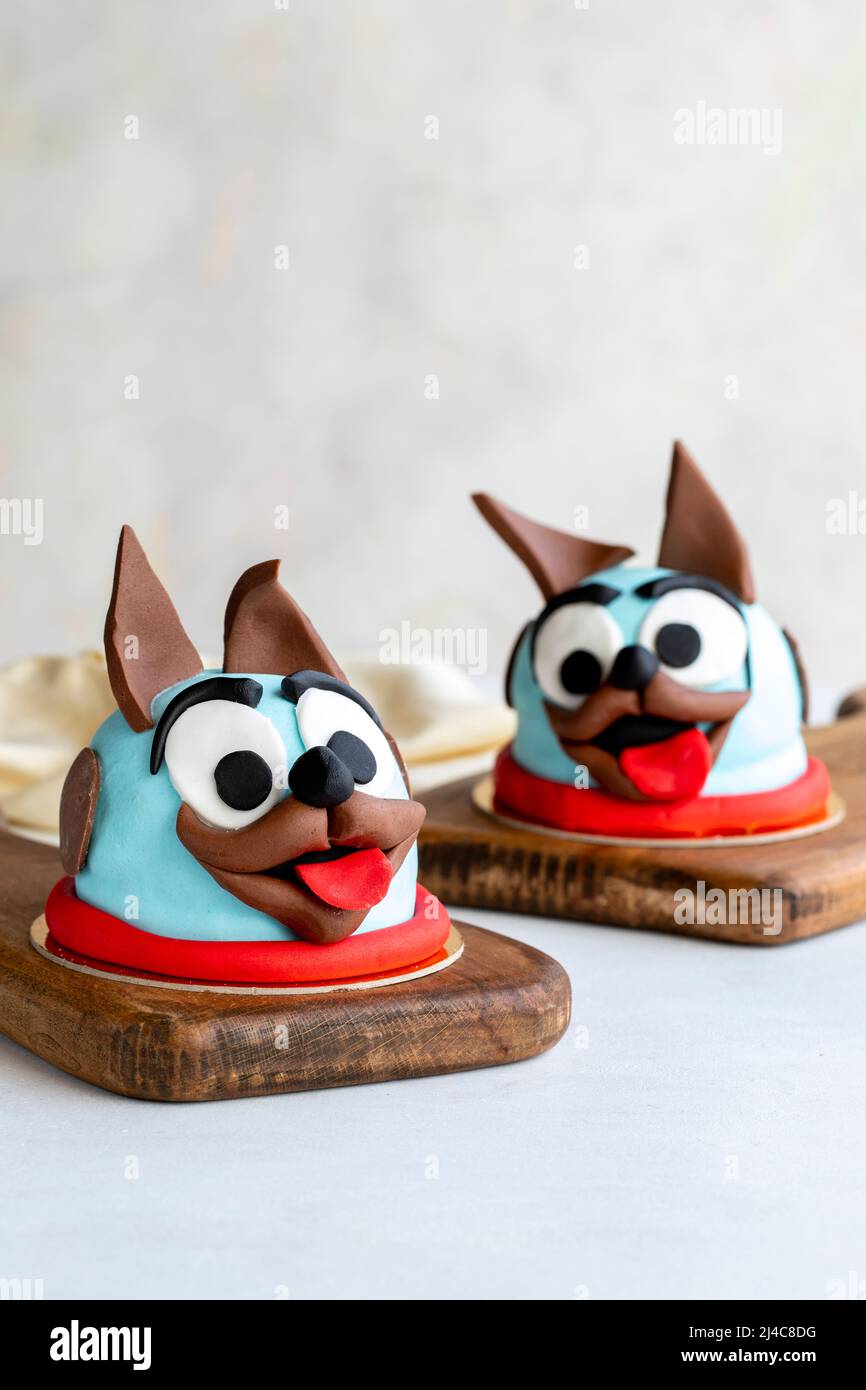 Dog design cake. Design cake with dog face on a white background ...