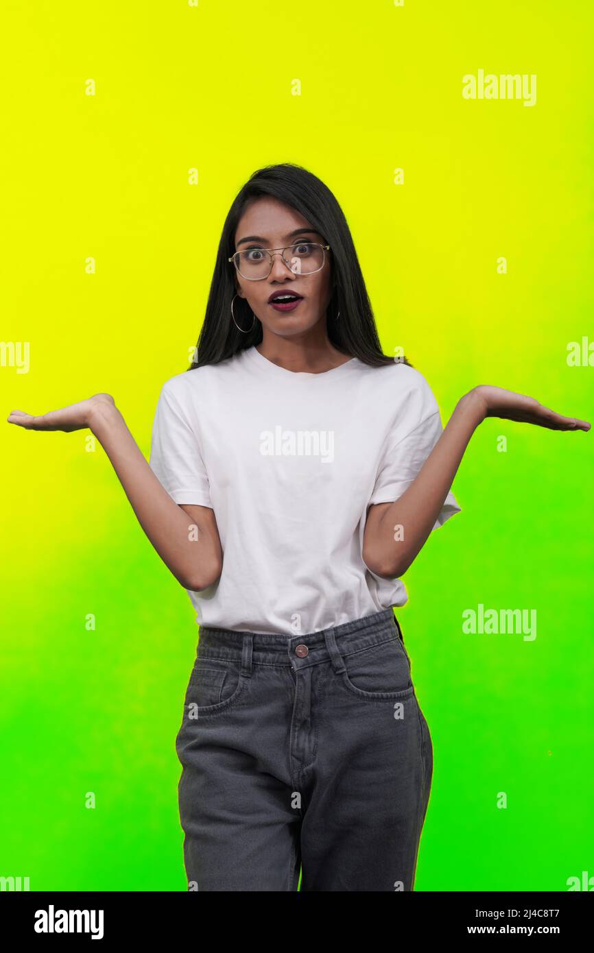 Advertisement concepts woman hands up. Excited happy Confused Indian ...