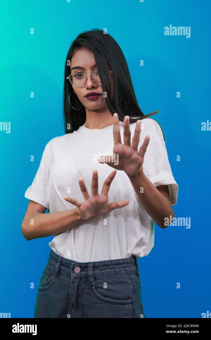 Asian girl saying stop hands hi-res stock photography and images - Alamy