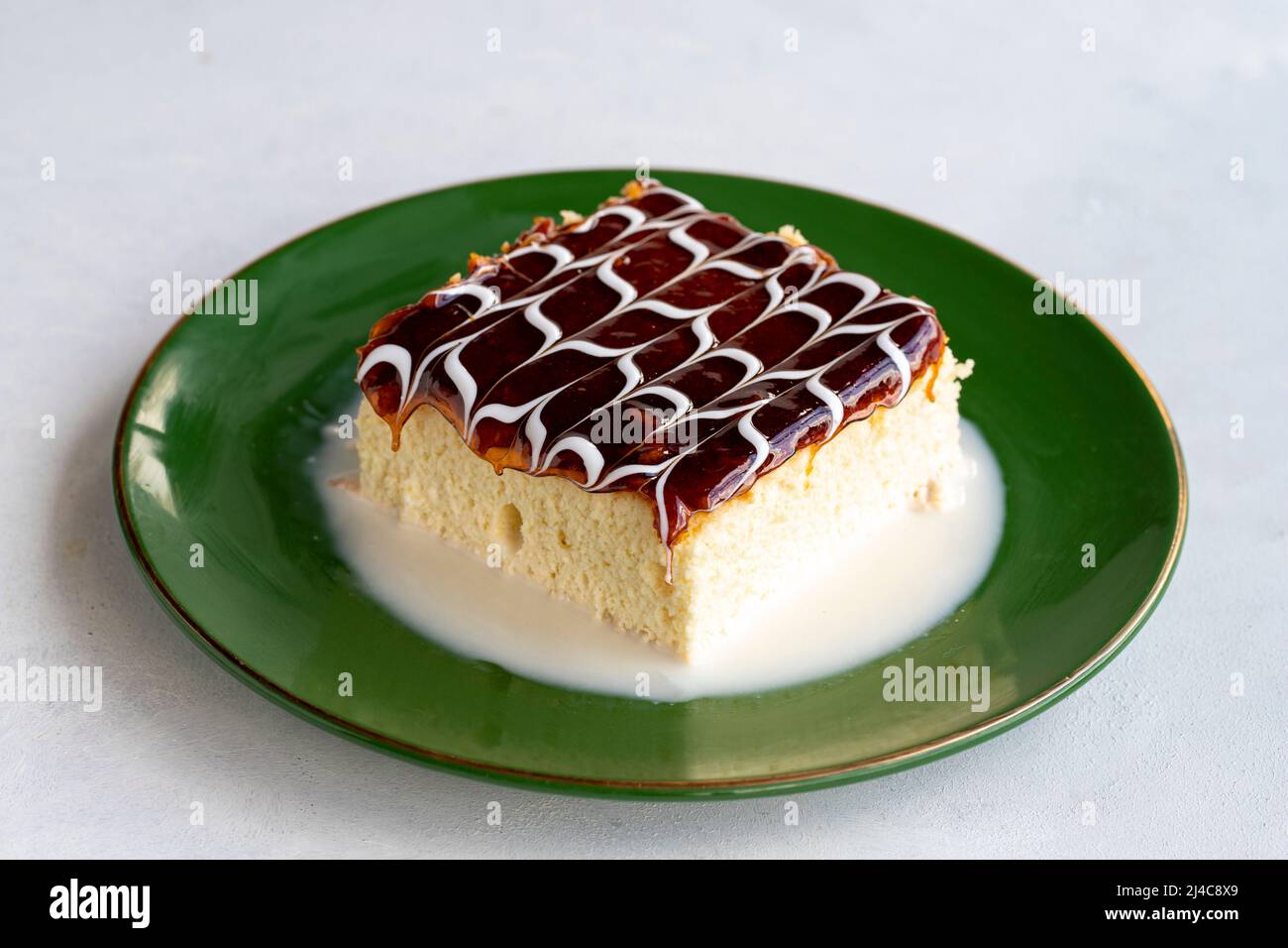 Caramel trilece cake. Trilece cake on a white background. . Bakery ...