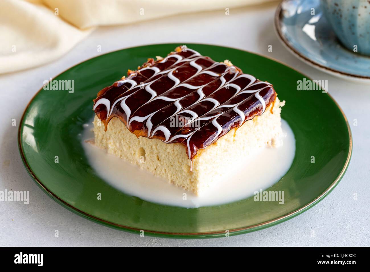 Caramel trilece cake. Trilece cake on a white background. . Bakery ...
