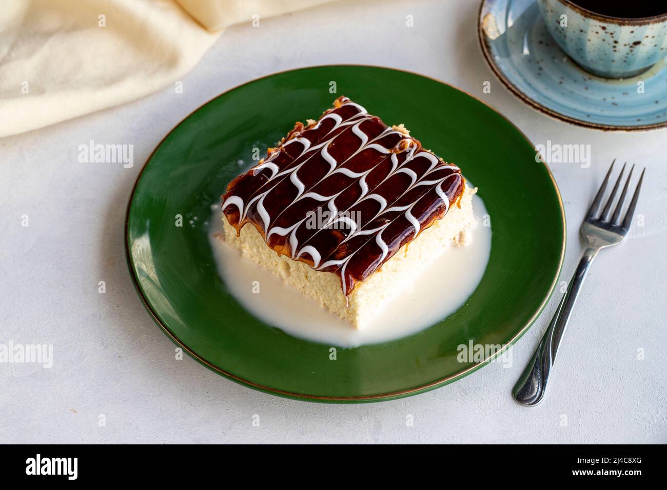 Caramel trilece cake. Trilece cake on a white background. . Bakery ...