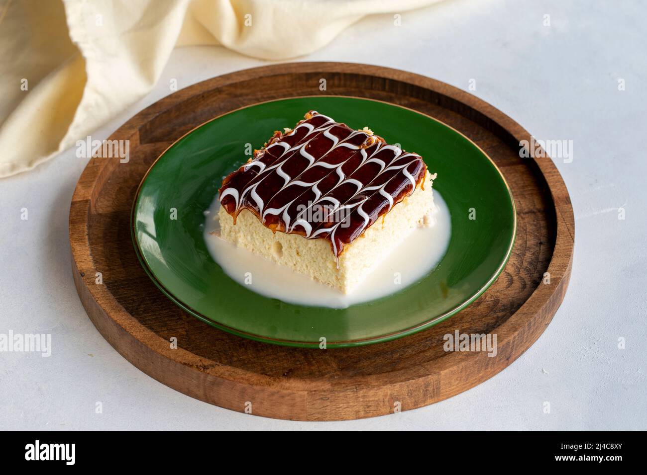 Caramel trilece cake. Trilece cake on a white background. . Bakery ...