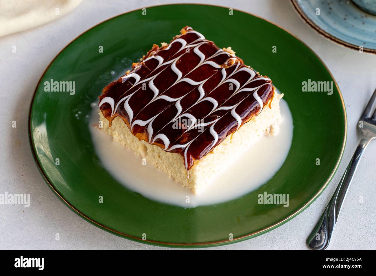 Caramel trilece cake. Trilece cake on a white background. . Bakery ...