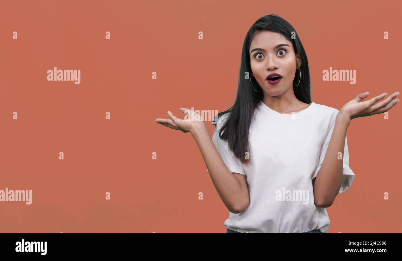 Advertisement concepts woman hands up. Excited happy Confused Indian ...