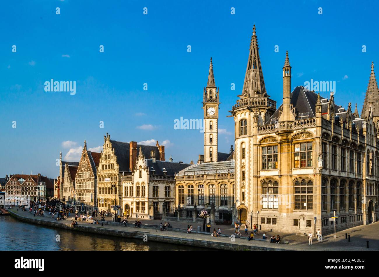 GHENT, BELGIUM - AUGUST 20, 2013: Urban landscape, people enjoying a ...