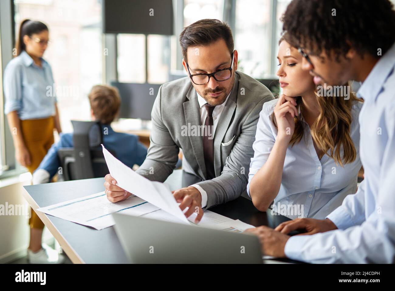 Group of multiethnic business people working at busy modern office ...