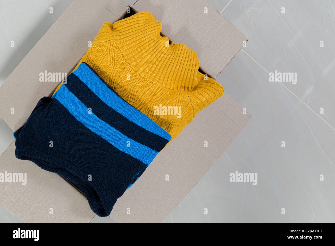 Coat donation box hi-res stock photography and images - Alamy