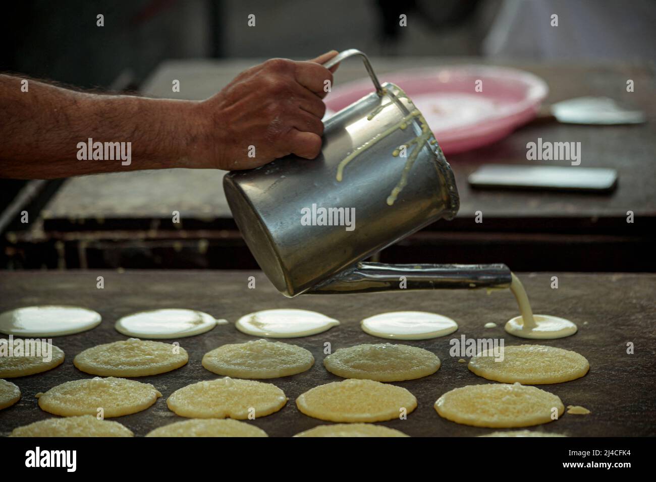 Palestinian sweets vendor equips "Qatayef" sweets during the holy month ...