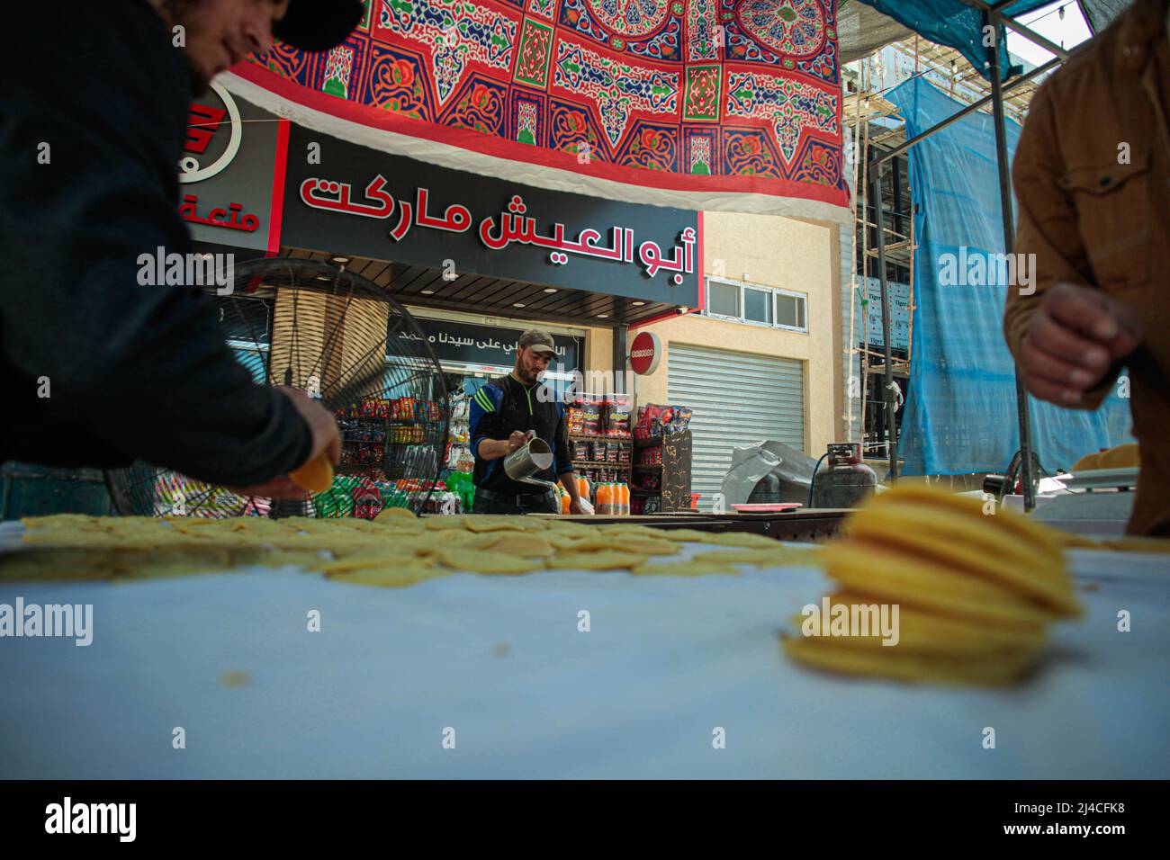Palestinian sweets vendor equips "Qatayef" sweets during the holy month ...