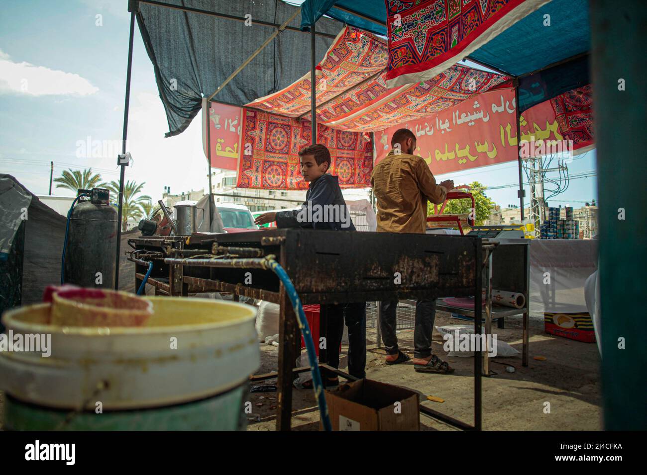 Palestinian sweets vendor equips "Qatayef" sweets during the holy month ...