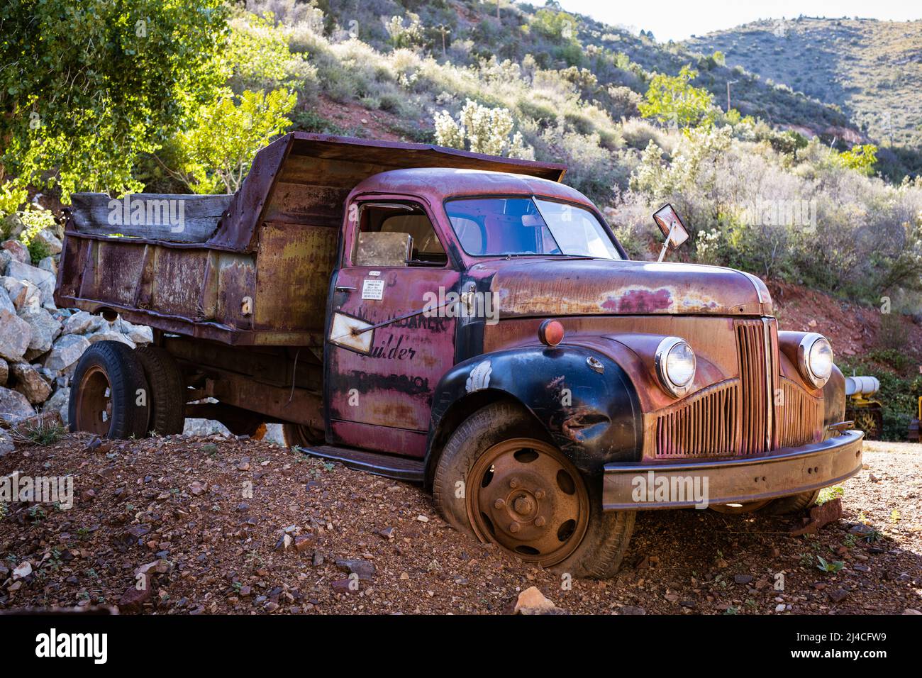 Old dump truck in a junk yard Stock Photo - Alamy