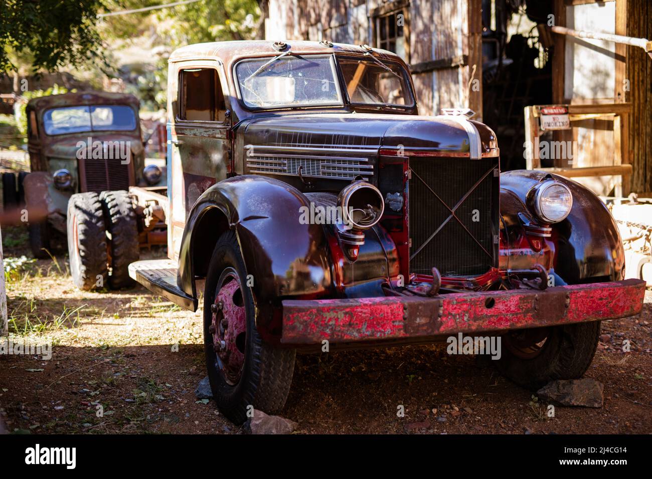 Antique trucks in junk yard Stock Photo - Alamy