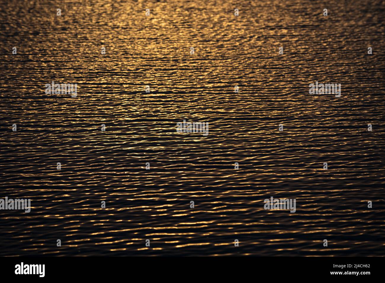 Sunrise sea water background. Reflection of sun in the ocean water ...