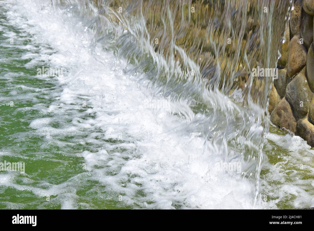 landscape of beautiful Artificial waterfall in garden at the public ...