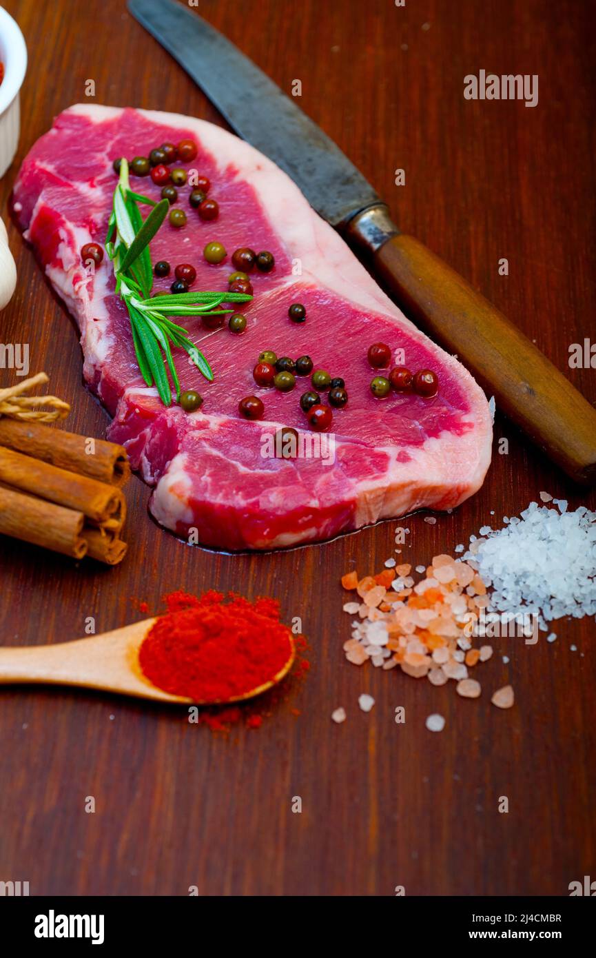 Raw uncooked ribeye beef steak butcher selection Stock Photo - Alamy