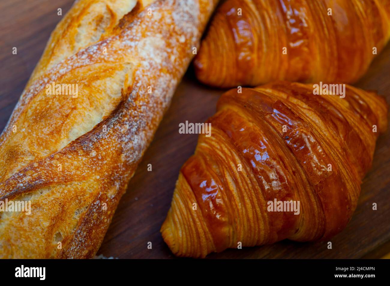 French fresh croissants and artisan baguette tradition Stock Photo - Alamy